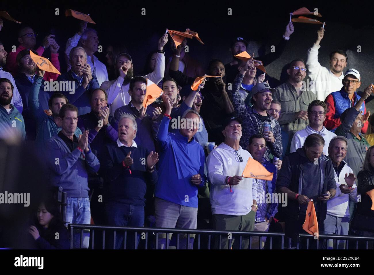 Fans cheer from the stands during the inaugural match of the TMRW Golf ...