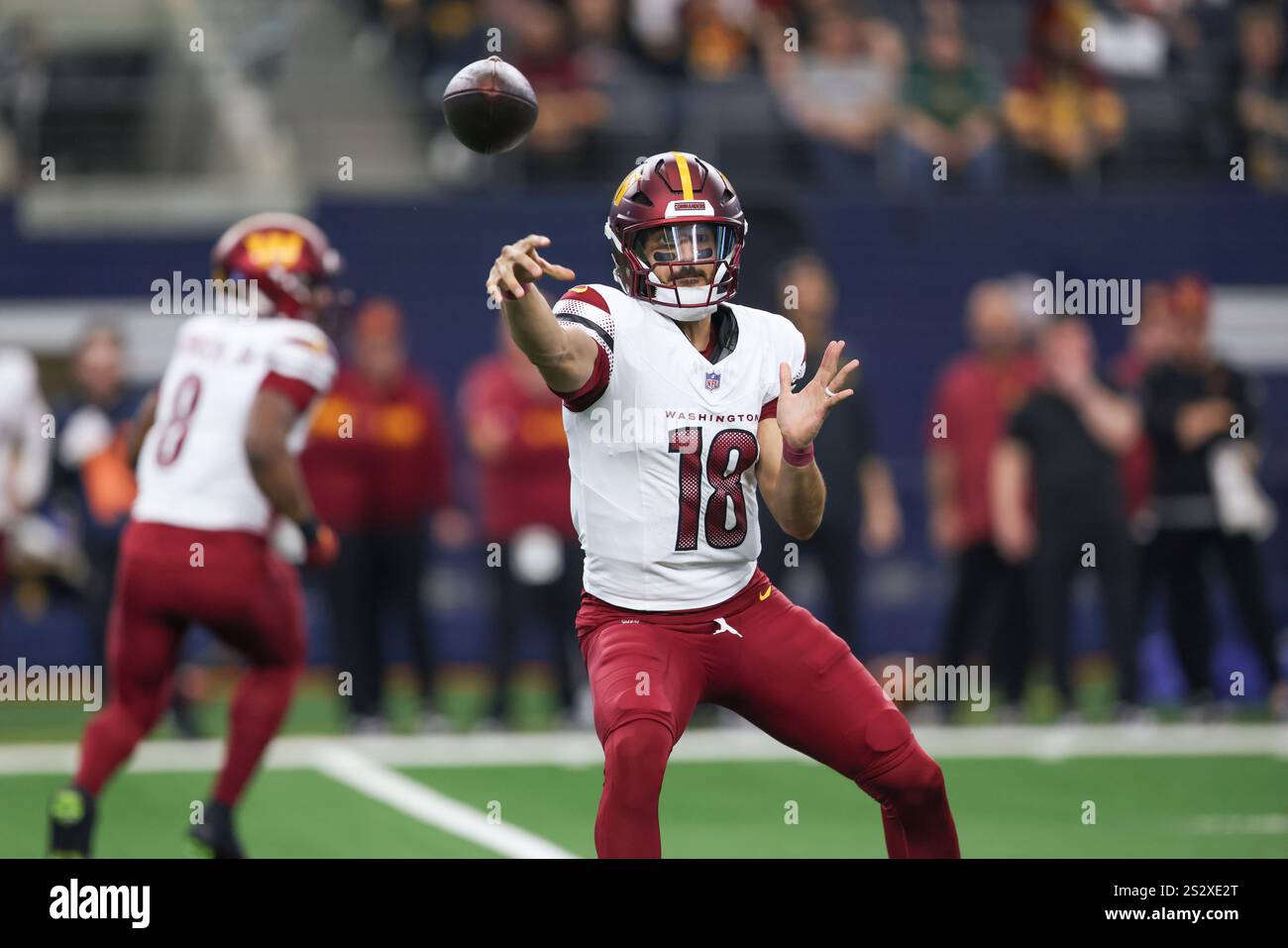 Washington Commanders quarterback Marcus Mariota throws a pass against ...
