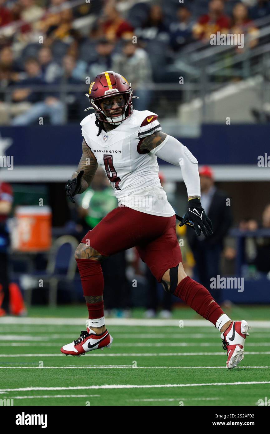 Washington Commanders linebacker Frankie Luvu (4) looks to defend ...