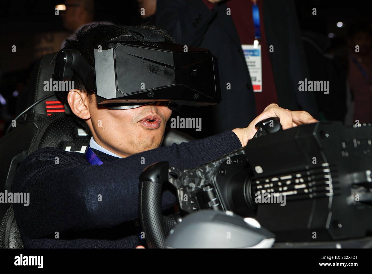 Las Vegas, NV, USA. 7th Jan, 2025. An attendee uses the Pimax VR ...