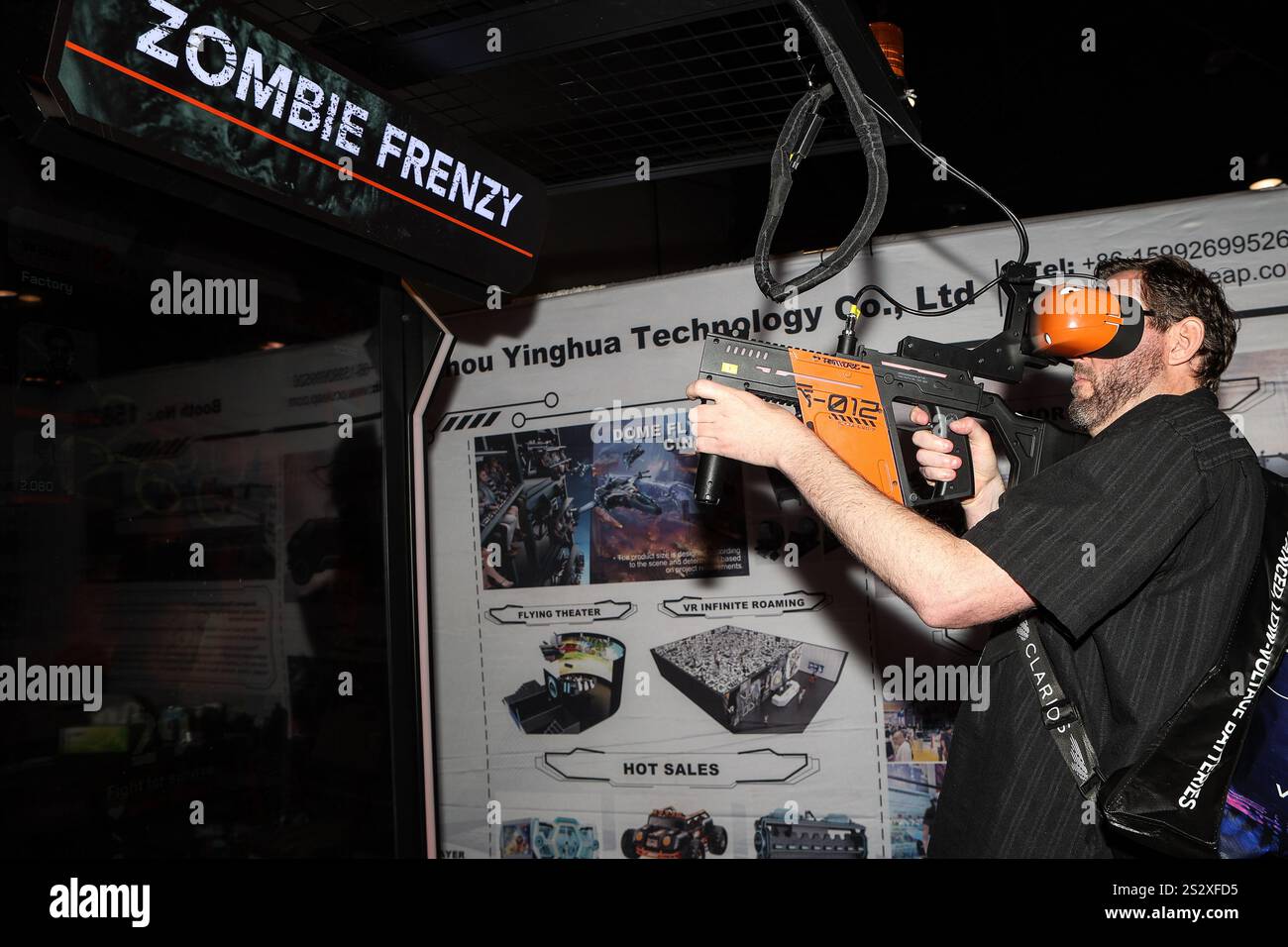 Las Vegas, NV, USA. 7th Jan, 2025. An attendee plays a Oculeap VR game ...