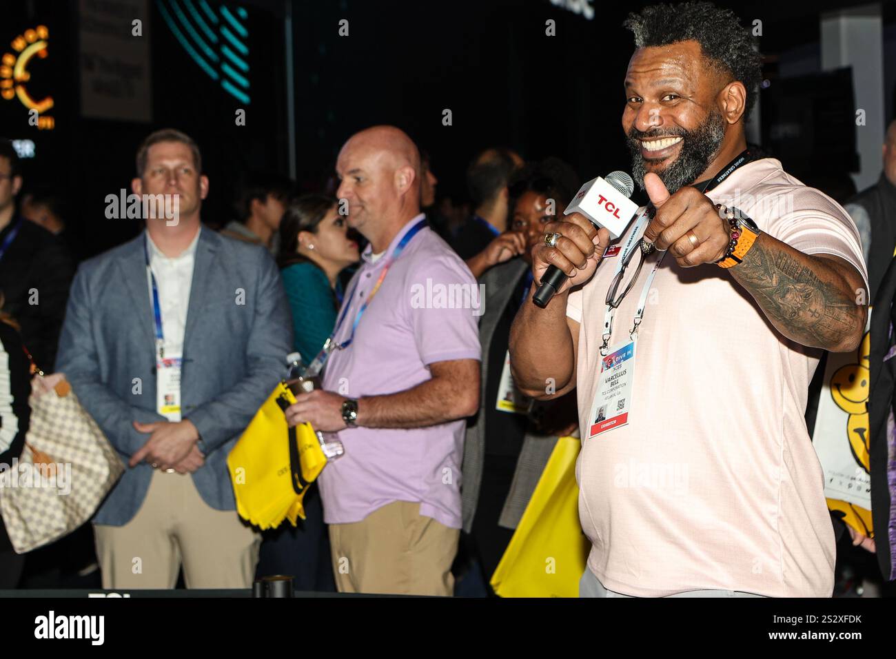 January 7, 2025: TCL representative Varcellus Bell smiles for the ...