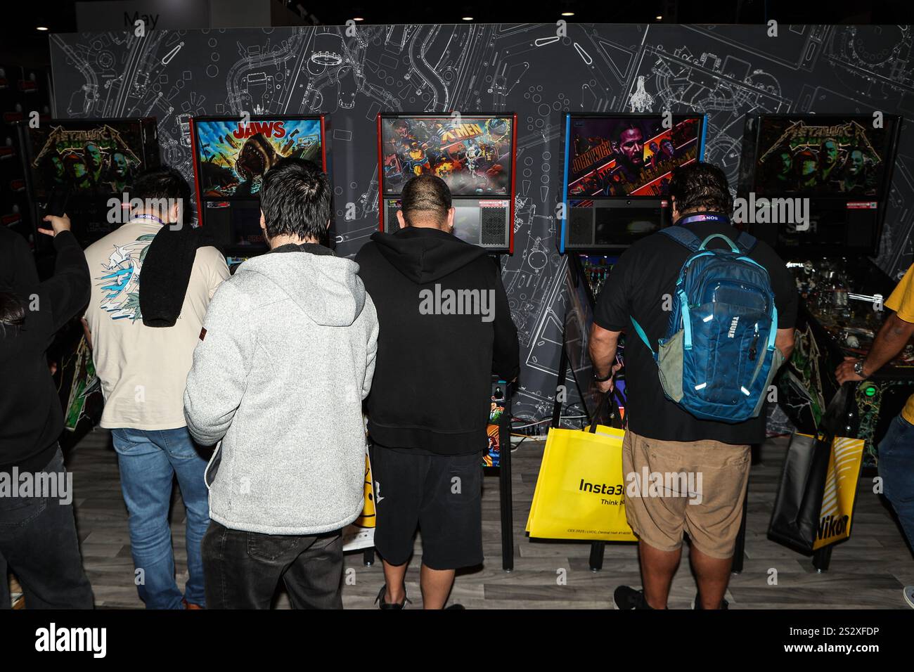 Las Vegas, NV, USA. 7th Jan, 2025. Attendees gather to play several ...