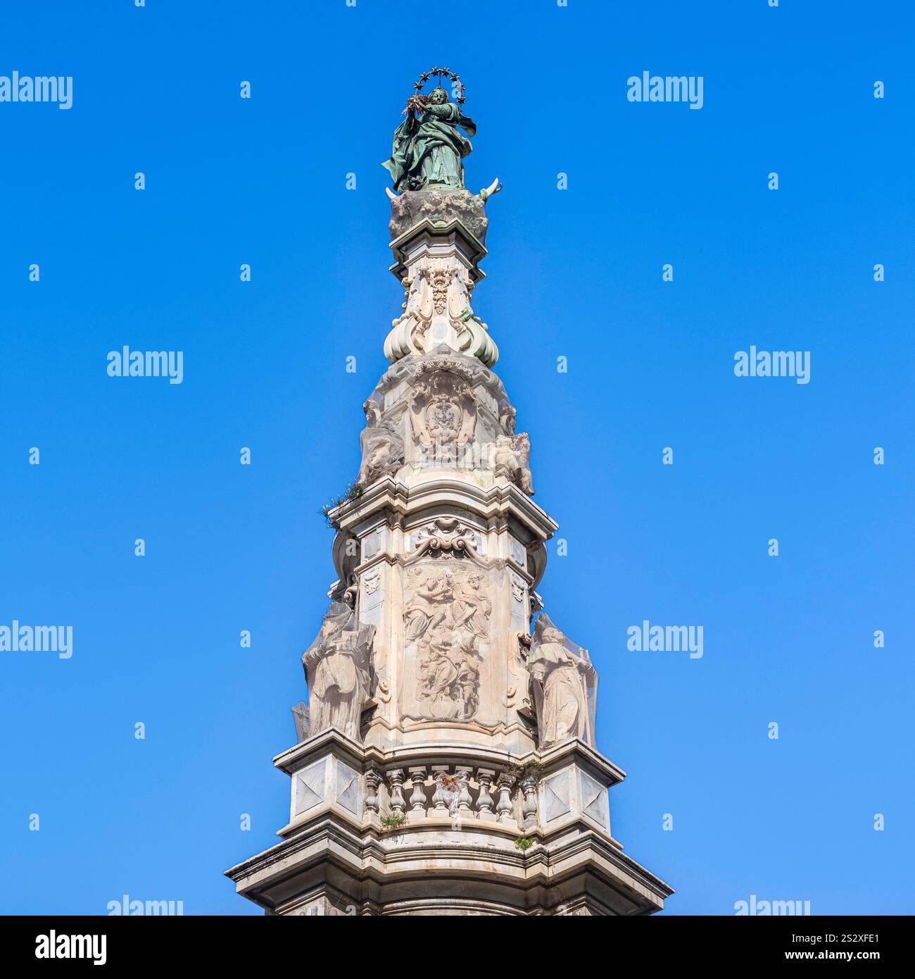 Statue of the Madonna holding a bouquet of roses - Naples, Italy Stock ...