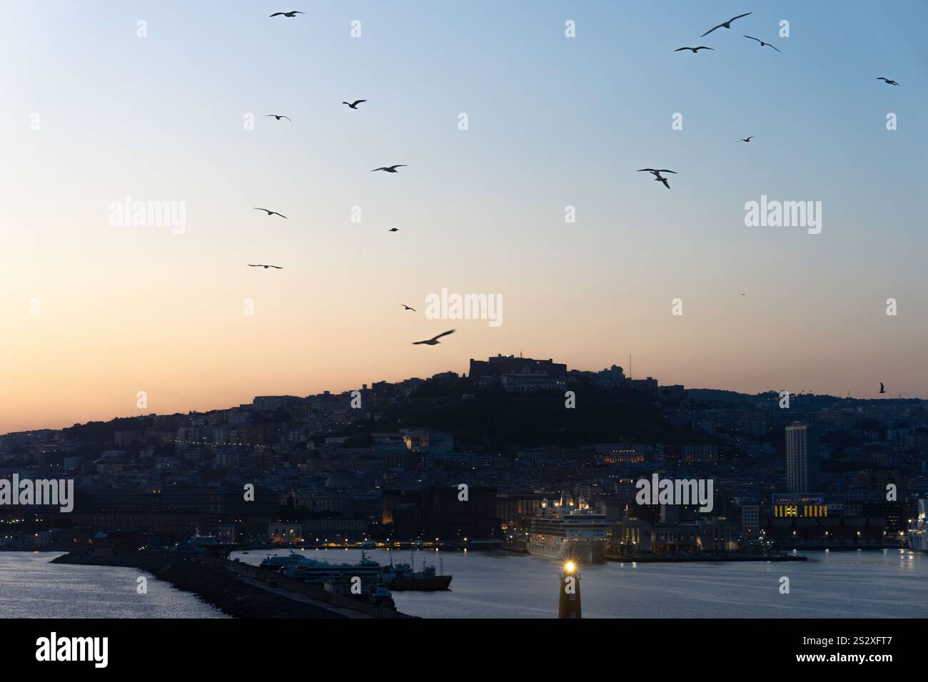 Sunset at the Port of Naples, Italy Stock Photo - Alamy