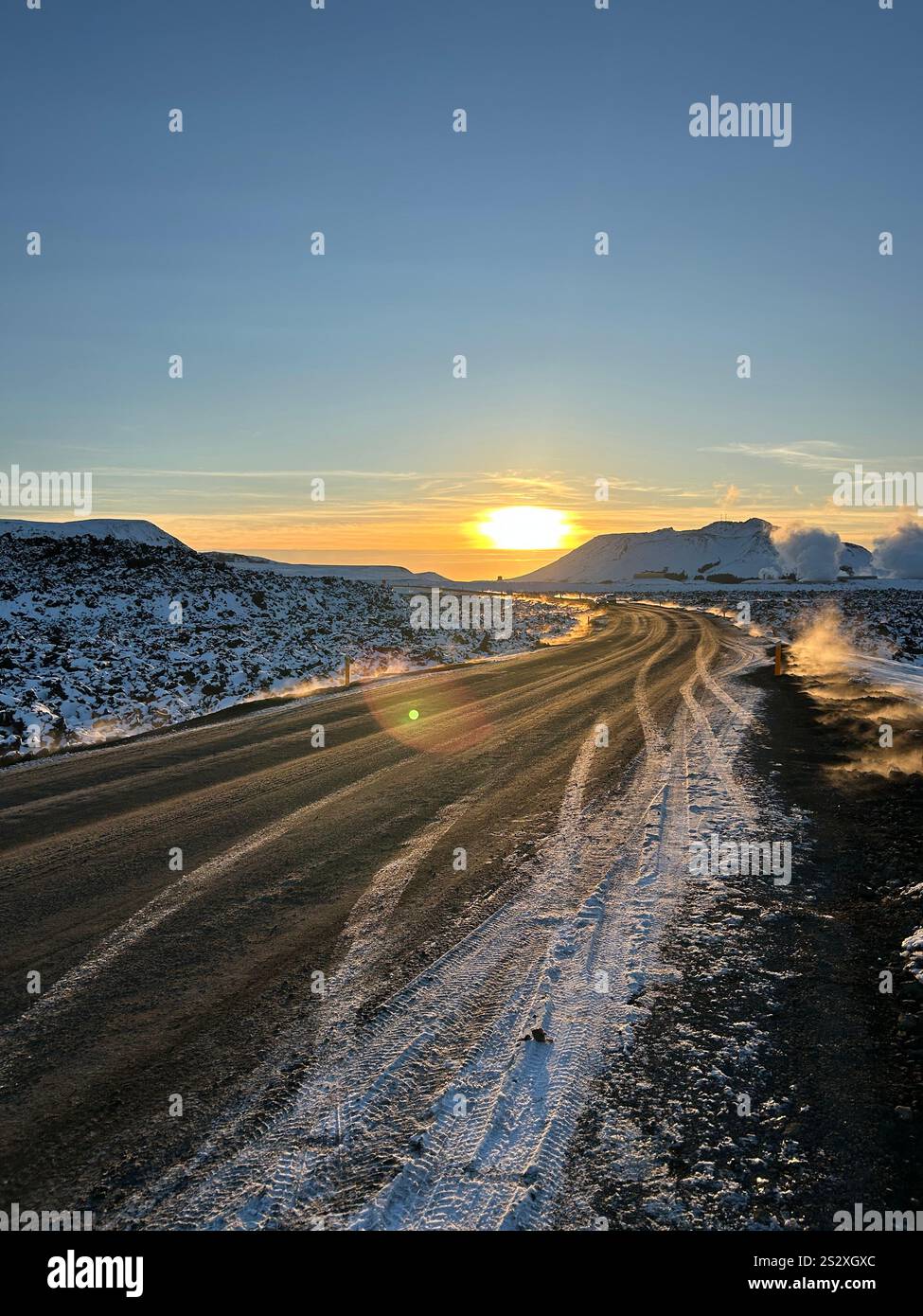 Road before Grindavik with steam, Iceland Stock Photo - Alamy