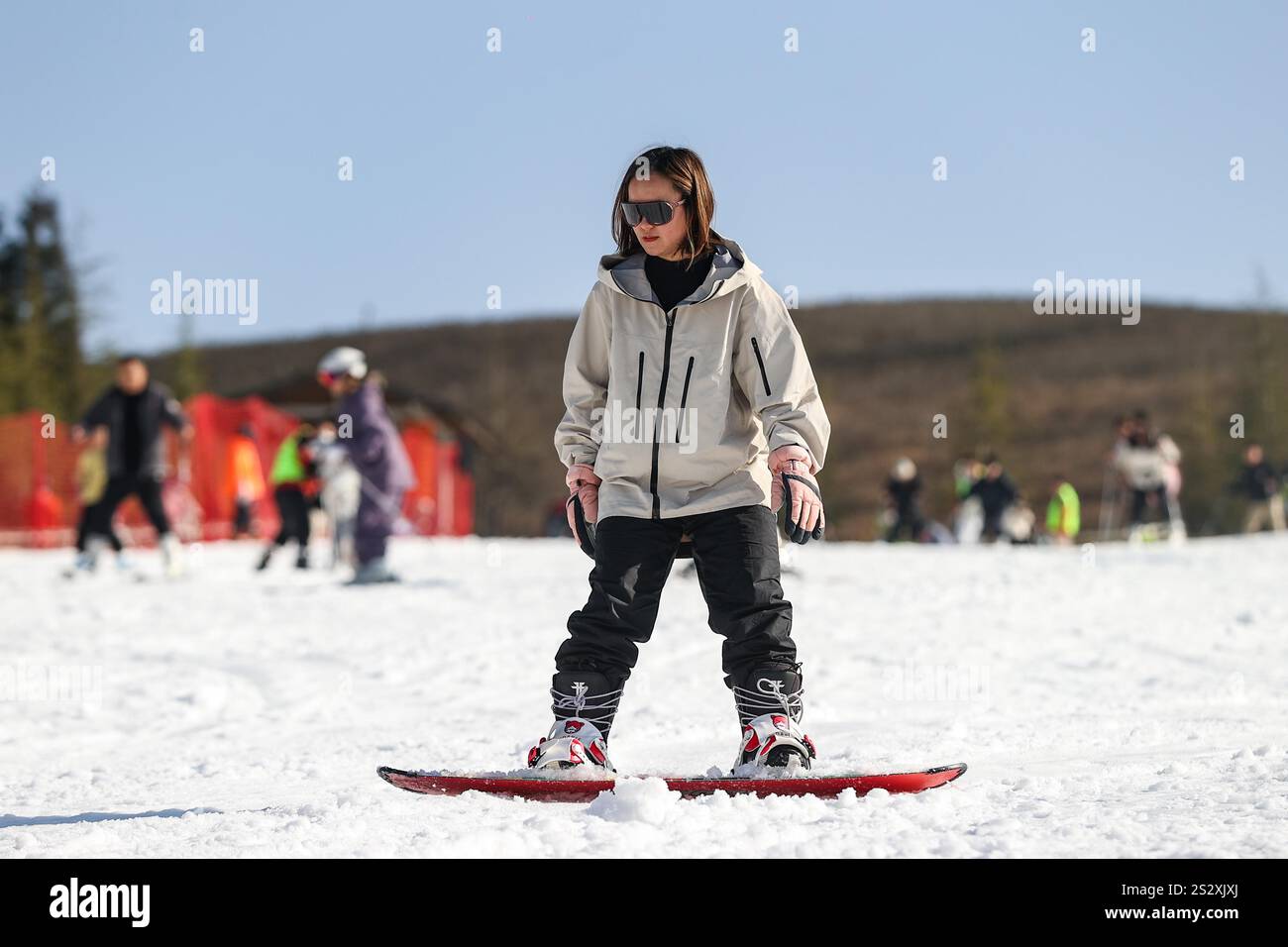 **CHINESE MAINLAND, HONG KONG, MACAU AND TAIWAN OUT** People enjoy snow ...
