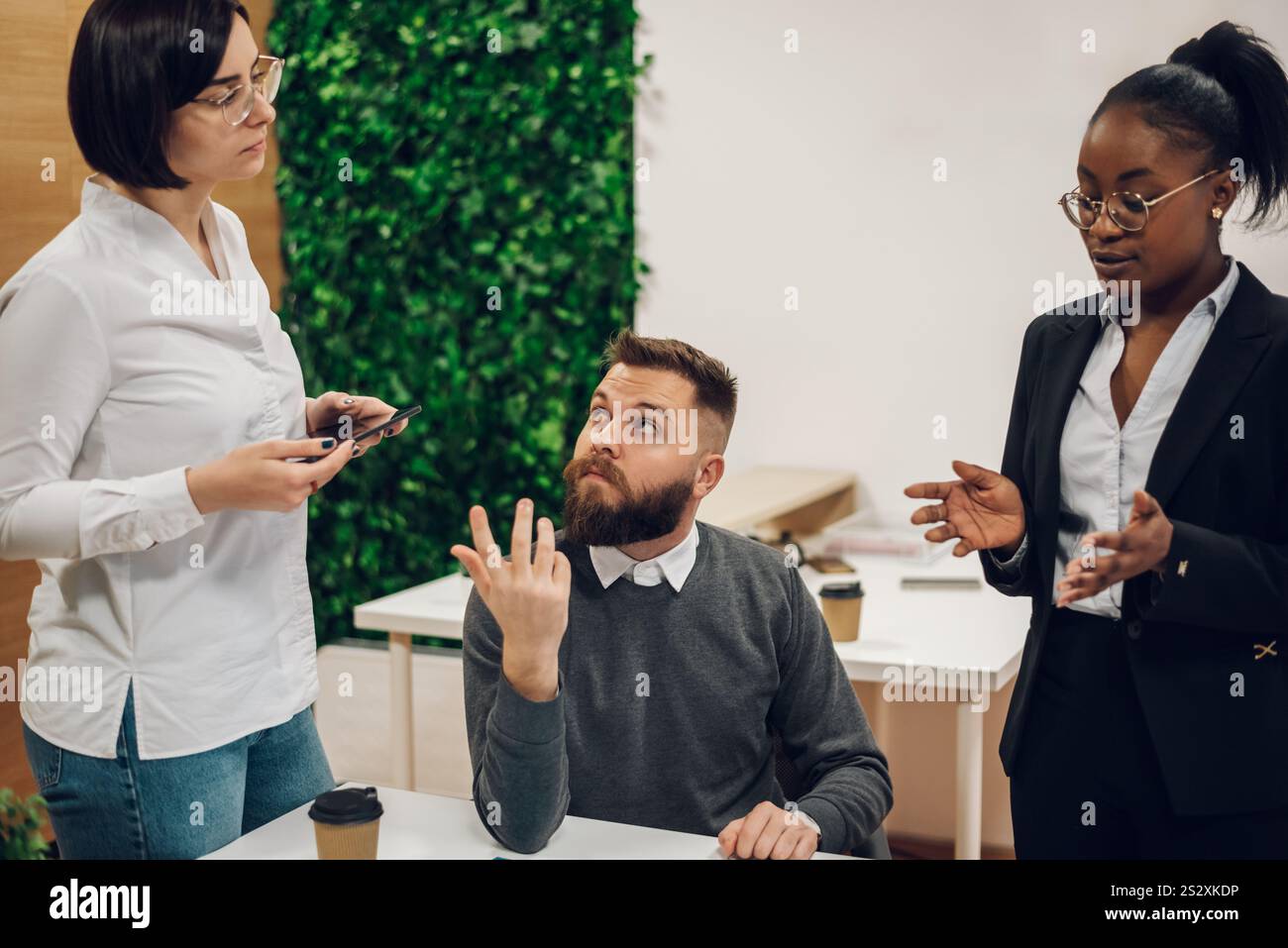 Team leader analyzing sales data statistics or explaining marketing ...