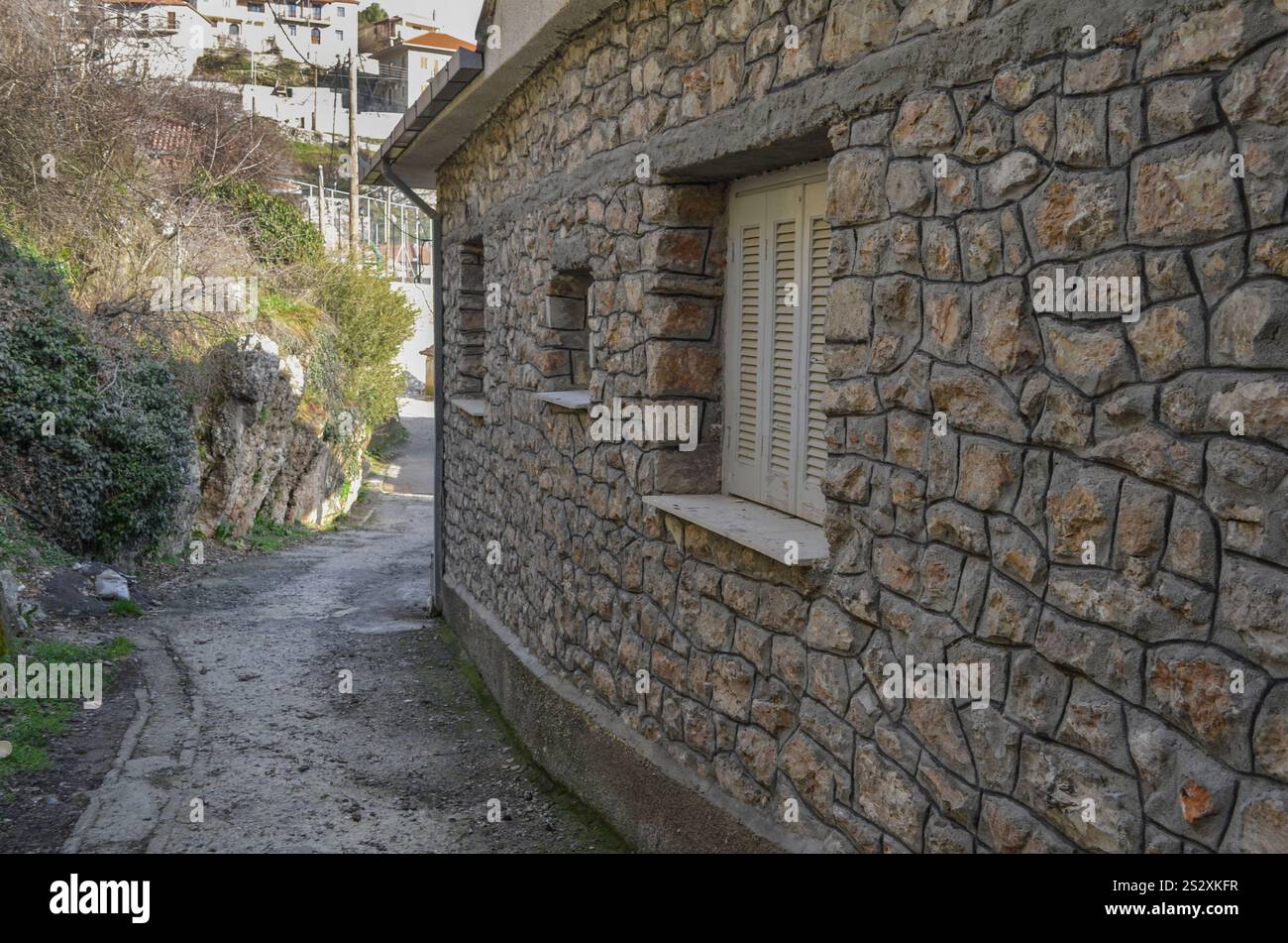 Traditional stone wall and windows in Arcadia, Greece Stock Photo - Alamy