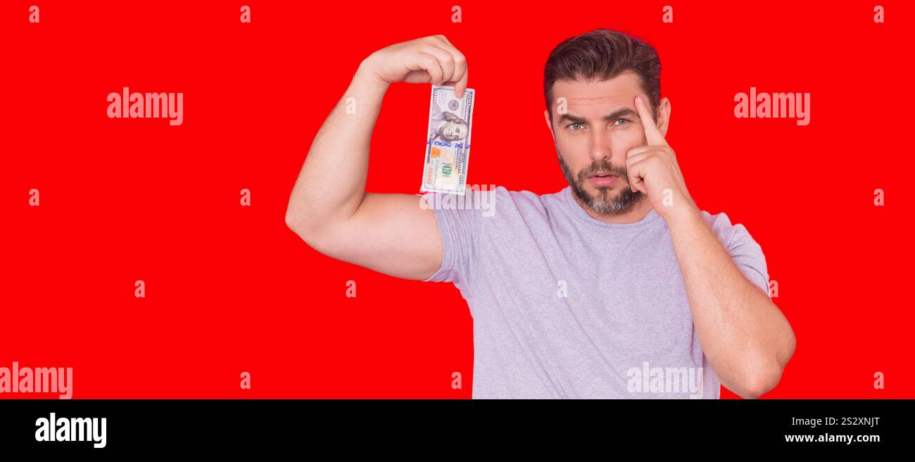 American man with money cash. Dollar banknotes. Portrait of man holding ...