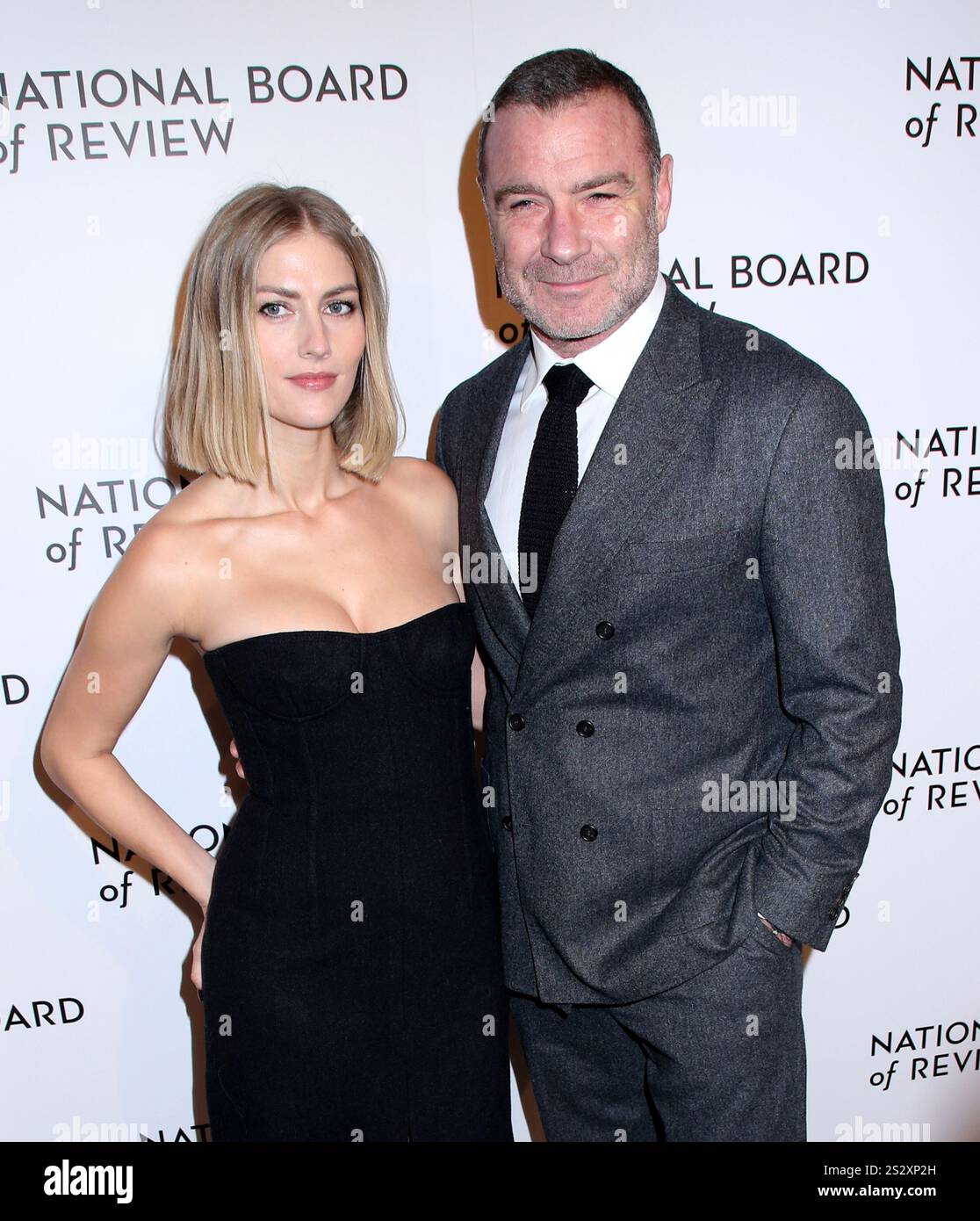 New York City, USA. 07th Jan, 2025. Liev Schreiber and Taylor Neisen ...