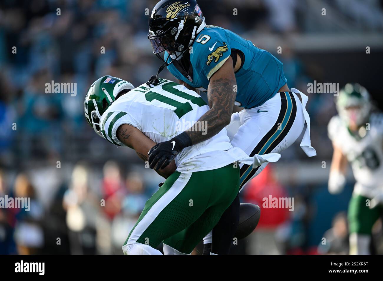 Jacksonville Jaguars safety Andre Cisco (5) breaks up a pass in the end ...