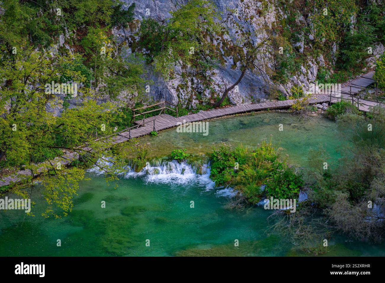 Nature and landscape. Waterfalls in the forest flowing into lakes ...