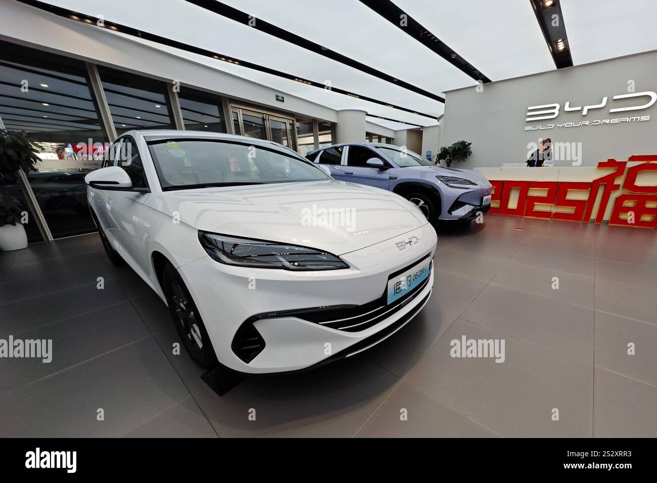 SHANGHAI, CHINA - JANUARY 8, 2025 - A new energy vehicle is displayed at a BYD flagship store in ...