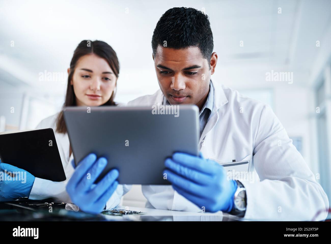 Lab, engineer and people with tablet, happy and collaboration for ...