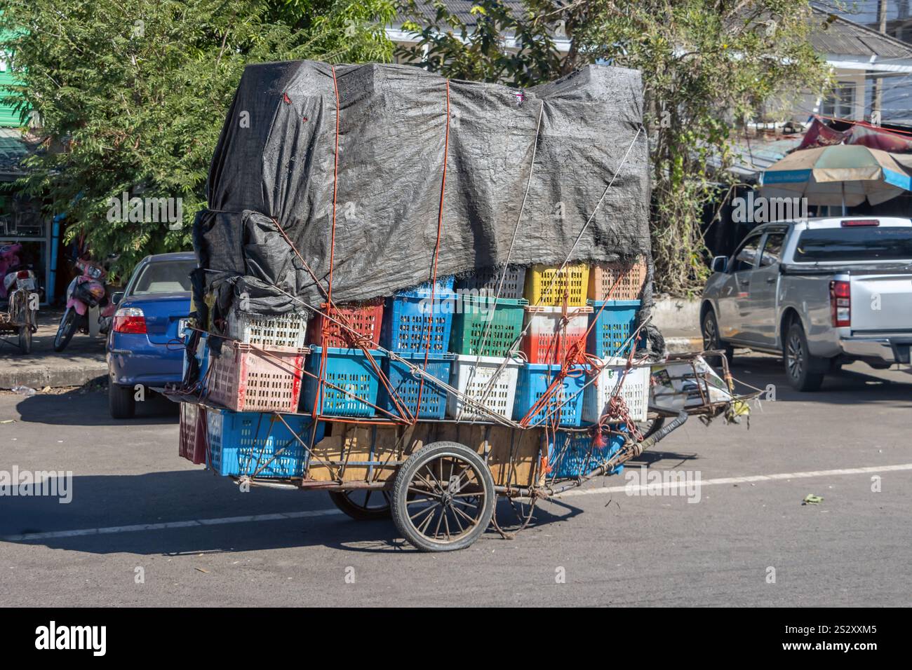 Fully loaded trolley of crates at the market near the border crossing ...
