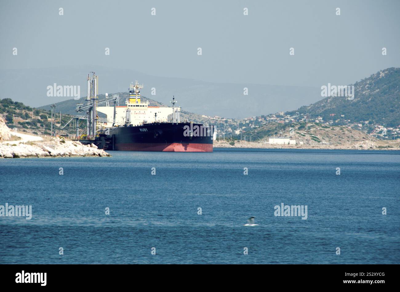 Greek gas tanker at liquefied natural gas terminal in Revithousa Stock ...