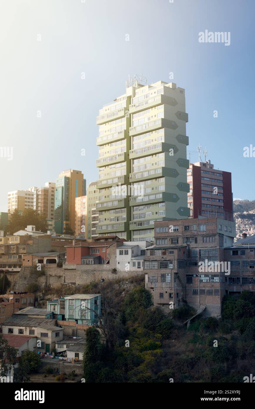 Towering apartment blocks rise above hillside dwellings, showcasing La ...