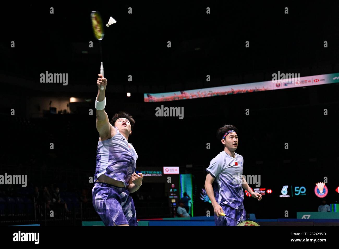 Kuala Lumpur, Malaysia. 8th Jan, 2025. Liang Weikeng (L)/Wang Chang of China compete during the ...