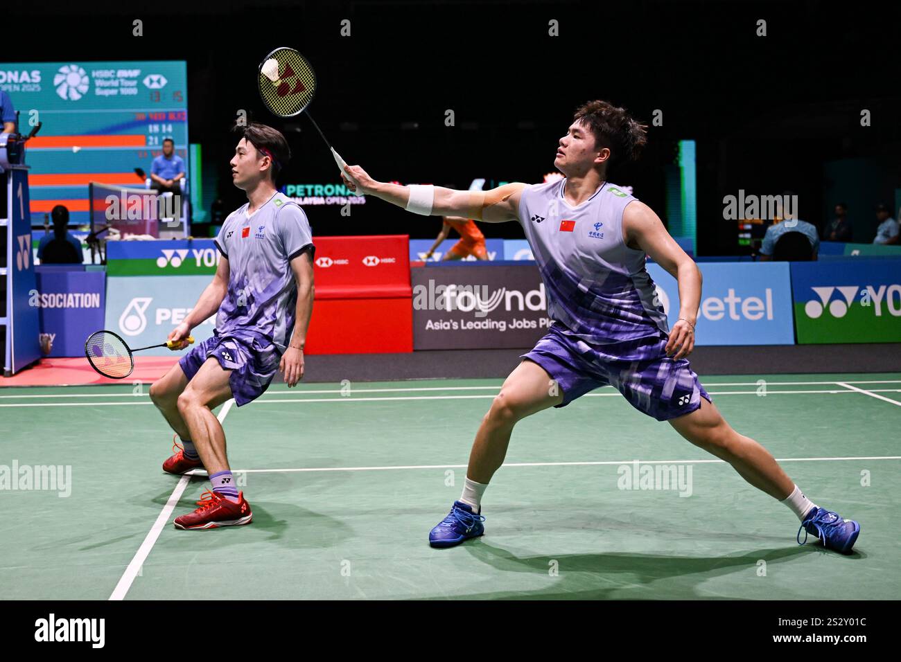 Kuala Lumpur, Malaysia. 8th Jan, 2025. Liang Weikeng (R)/Wang Chang of China compete during the ...