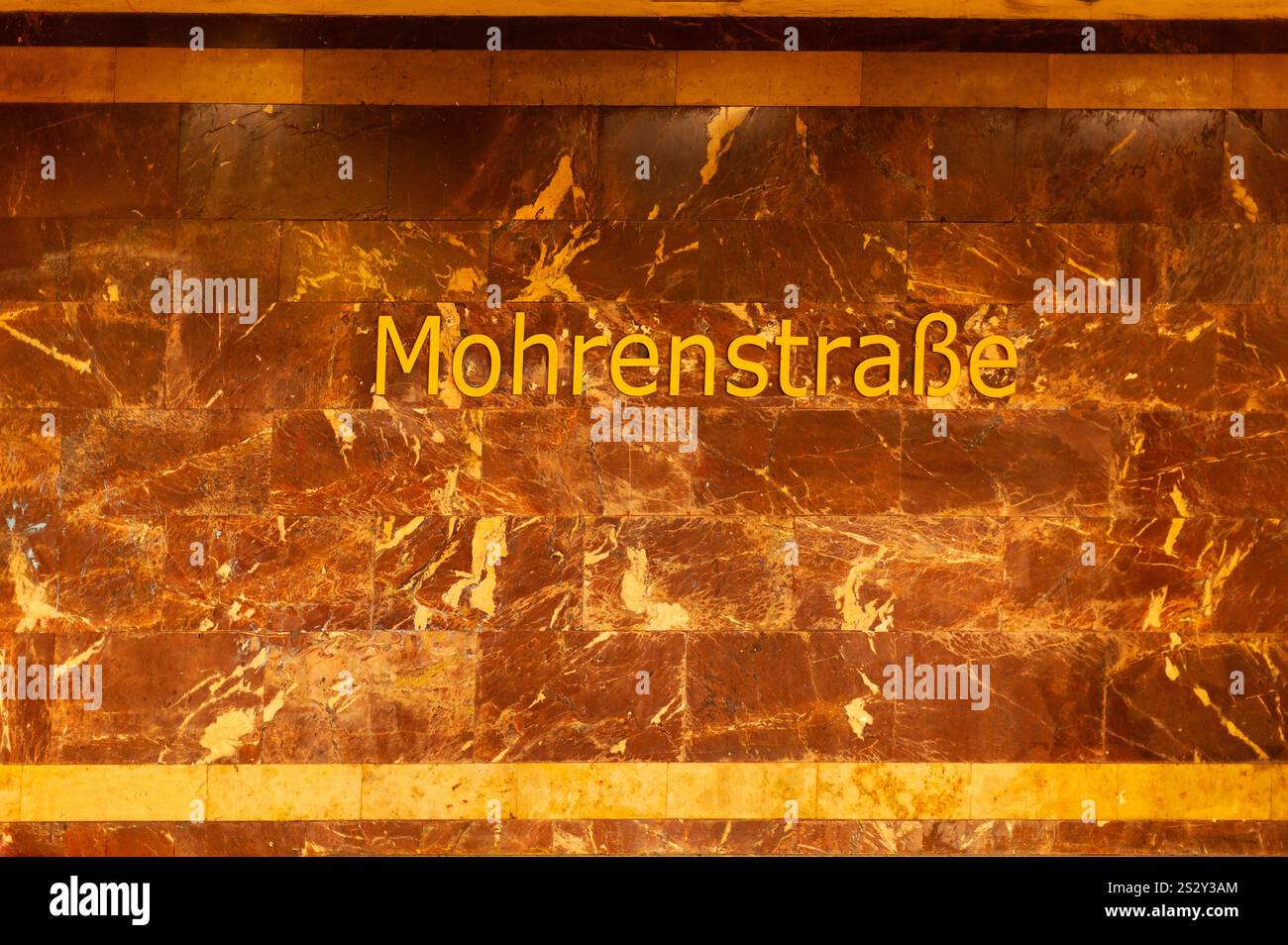 Mohrenstasse underground metro station in Berlin, Germany. Red marble ...