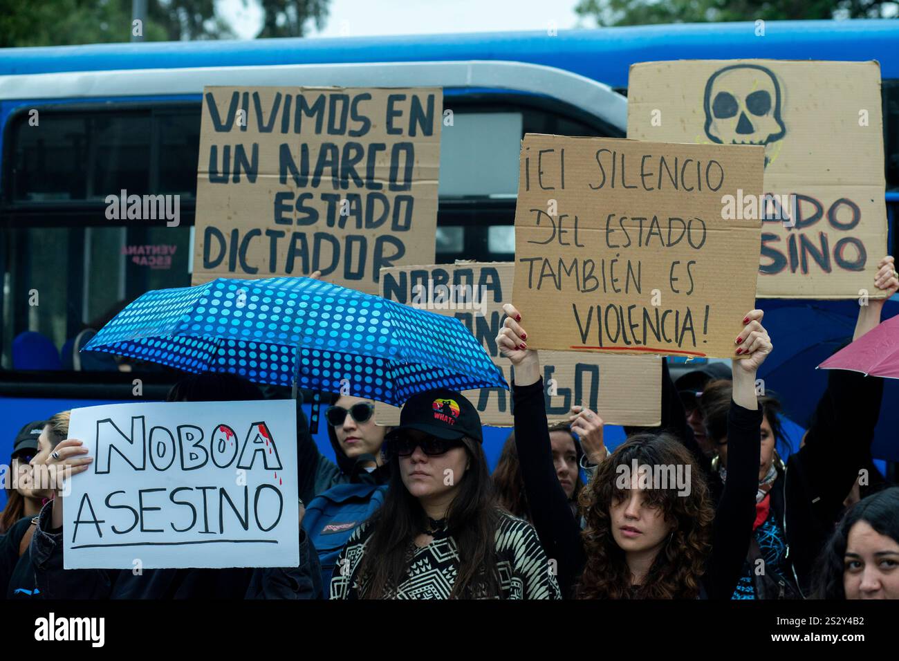 Protesters hold placards during the protest. After several days of fear ...