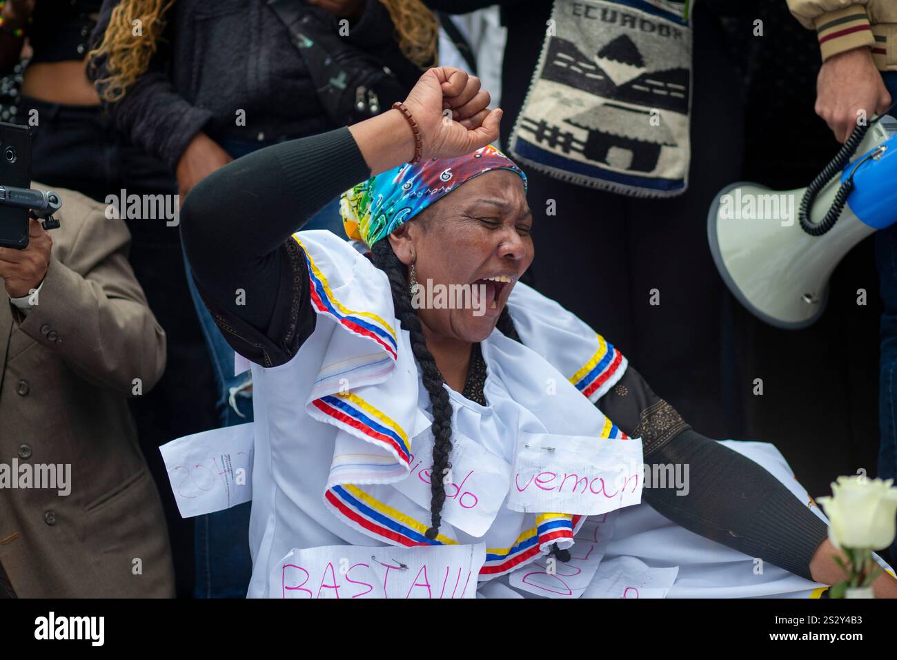 A woman chants slogans during the protest. After several days of fear ...