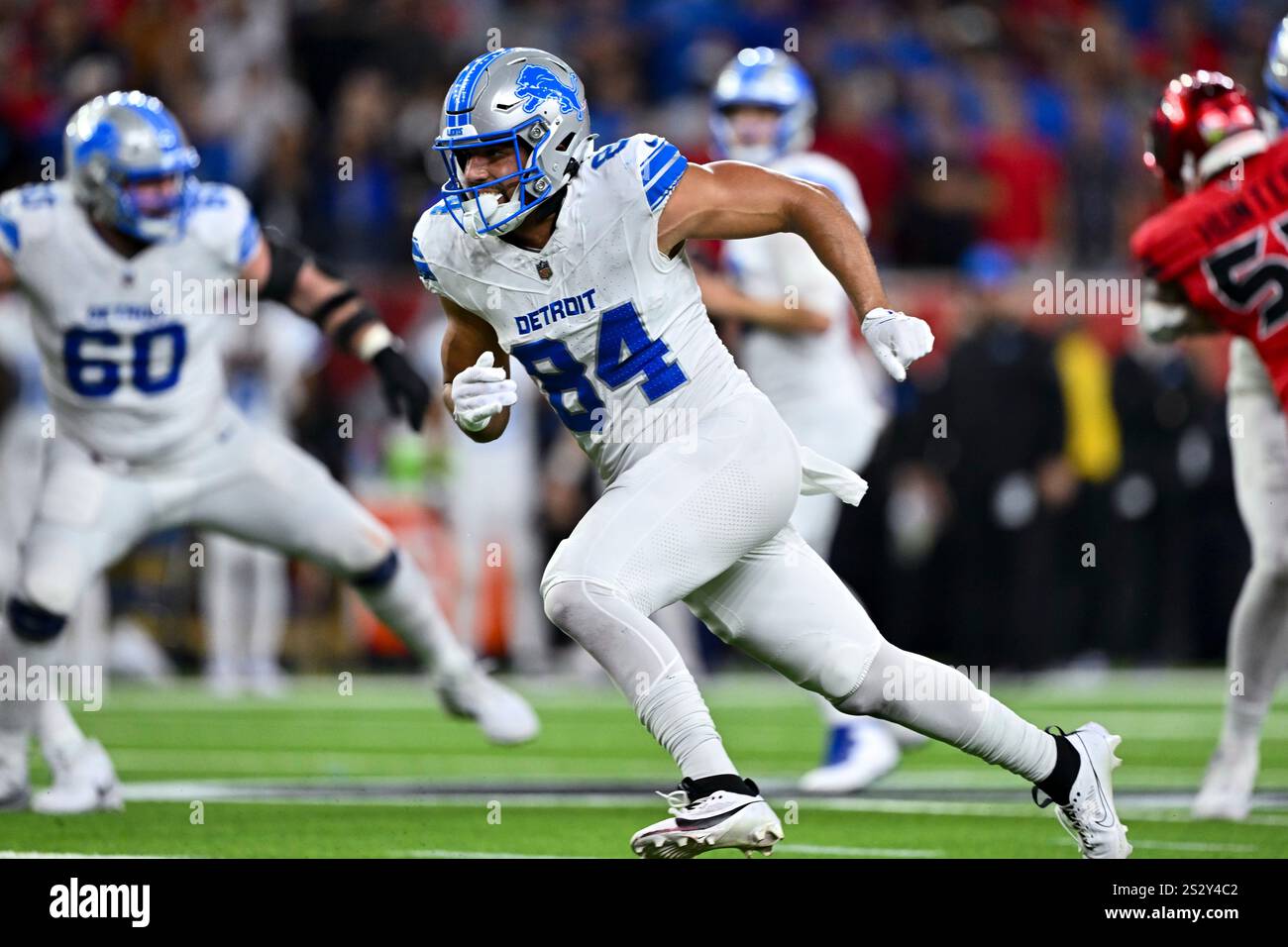 Detroit Lions tight end Shane Zylstra (84) runs a route i2h against the ...