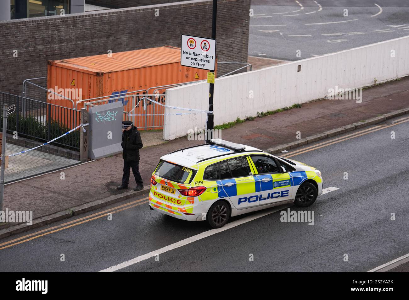 A police officer on Woolwich Church Road in Woolwich, south London ...