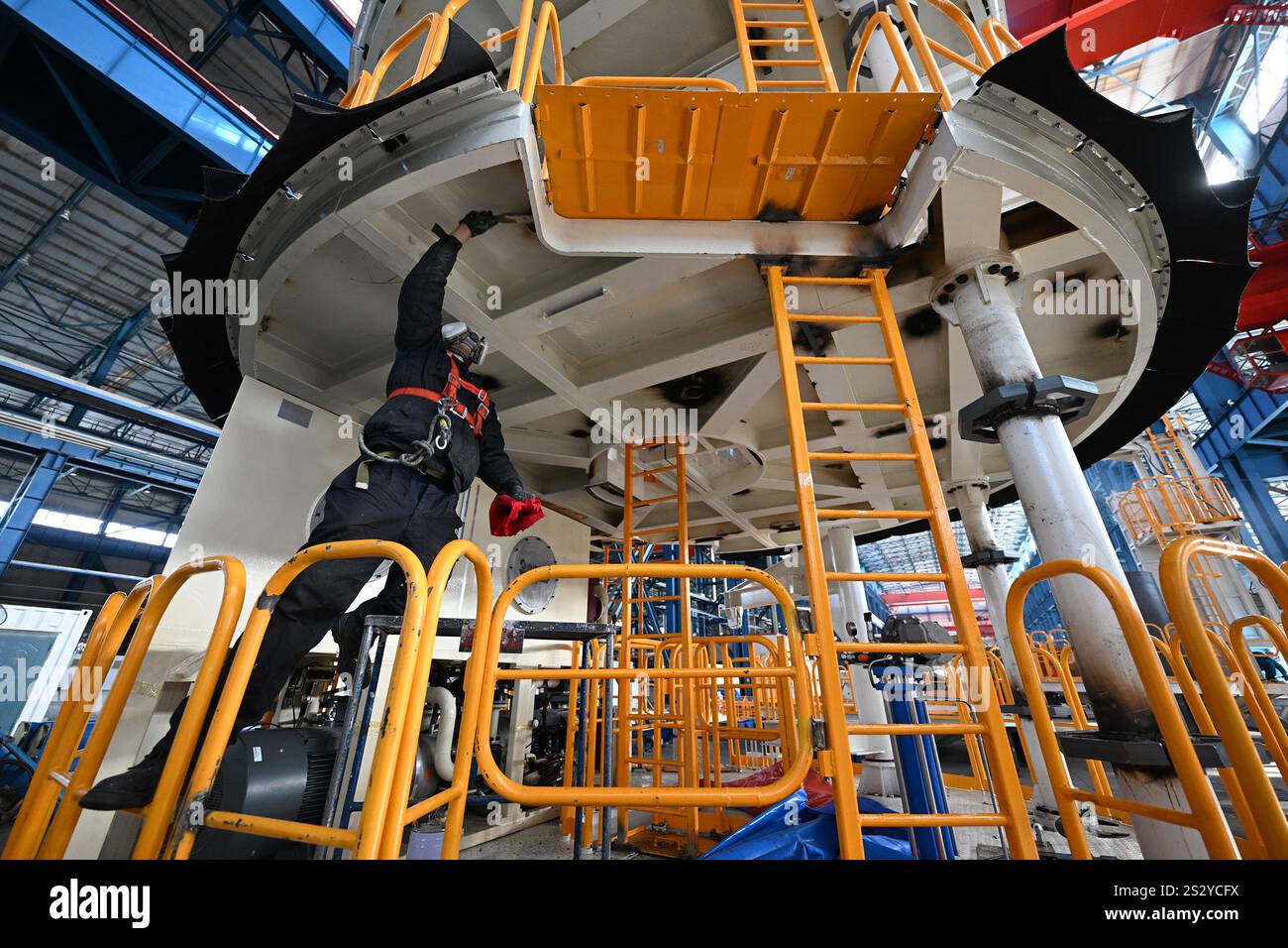 SHENYANG, CHINA - JANUARY 8, 2025 - Workers assemble the first ...