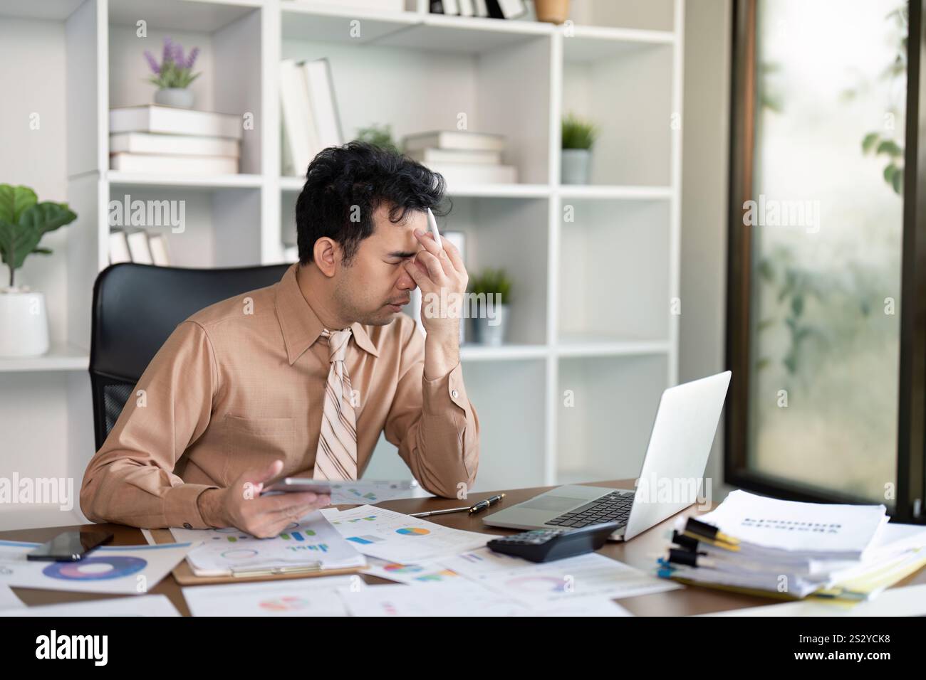 Overworking in business leads to stress a man struggle in a modern ...