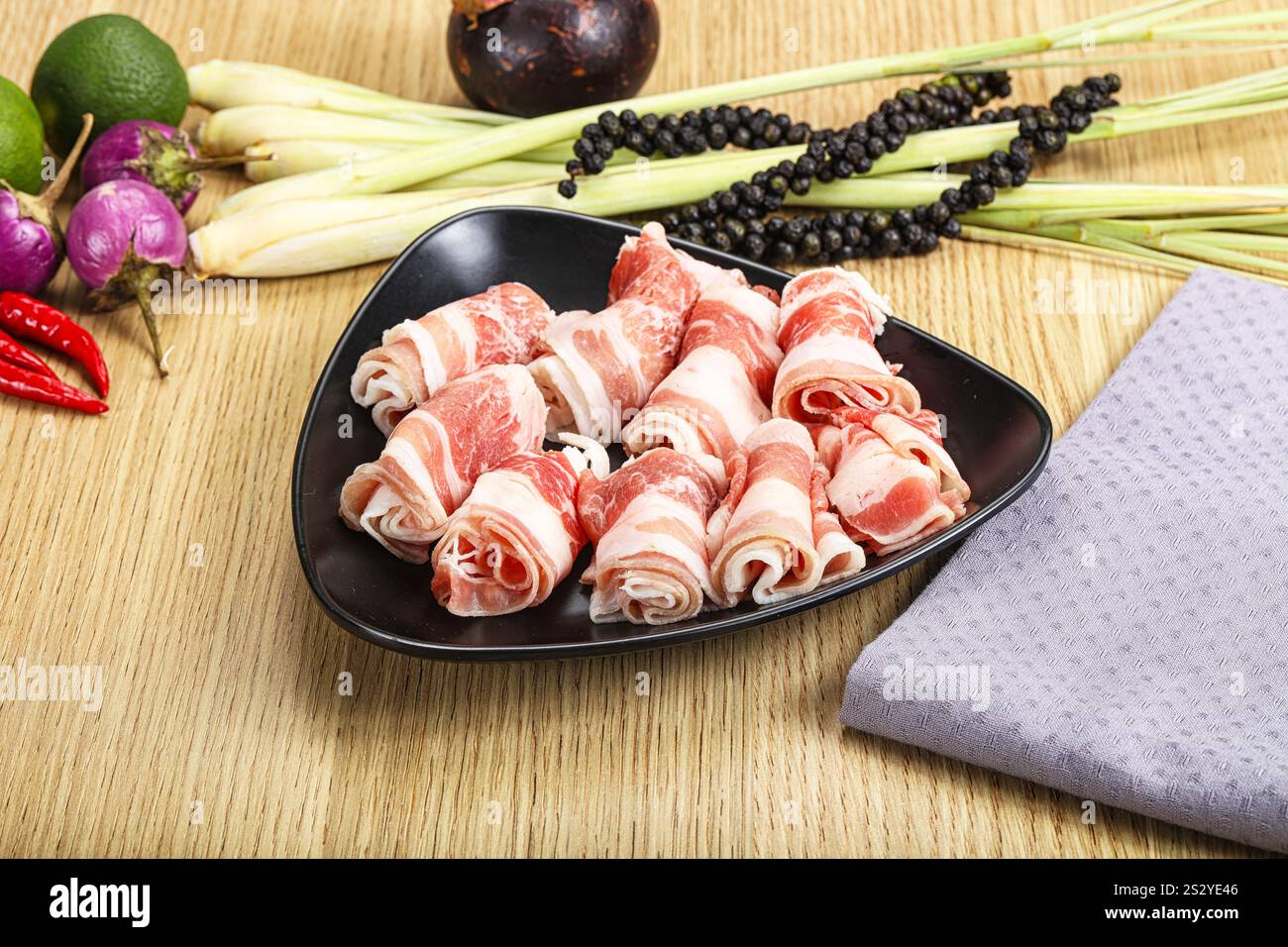 Raw beef bacon roll for grill Stock Photo - Alamy