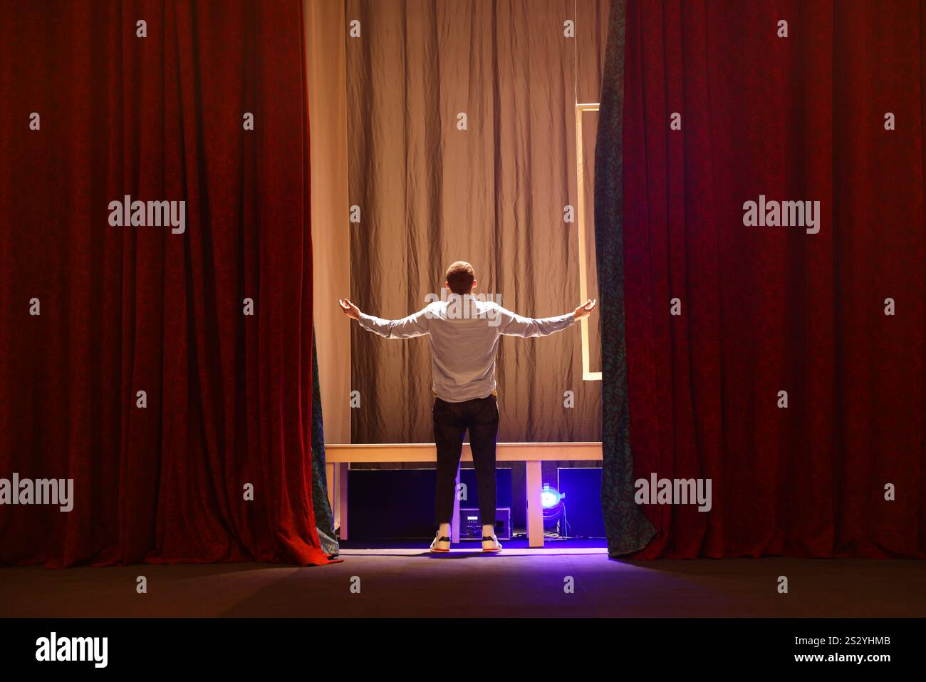 Professional actor rehearsing on stage in theatre, back view Stock ...