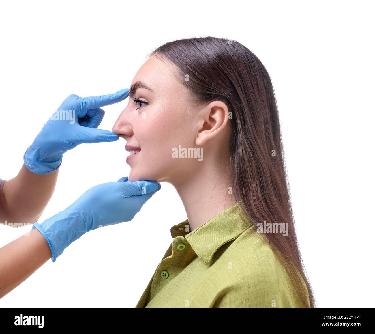 Doctor checking patient's nose before plastic surgery operation on ...