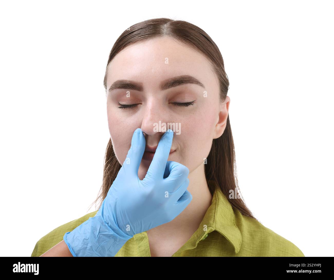 Doctor checking patient's nose before plastic surgery operation on ...