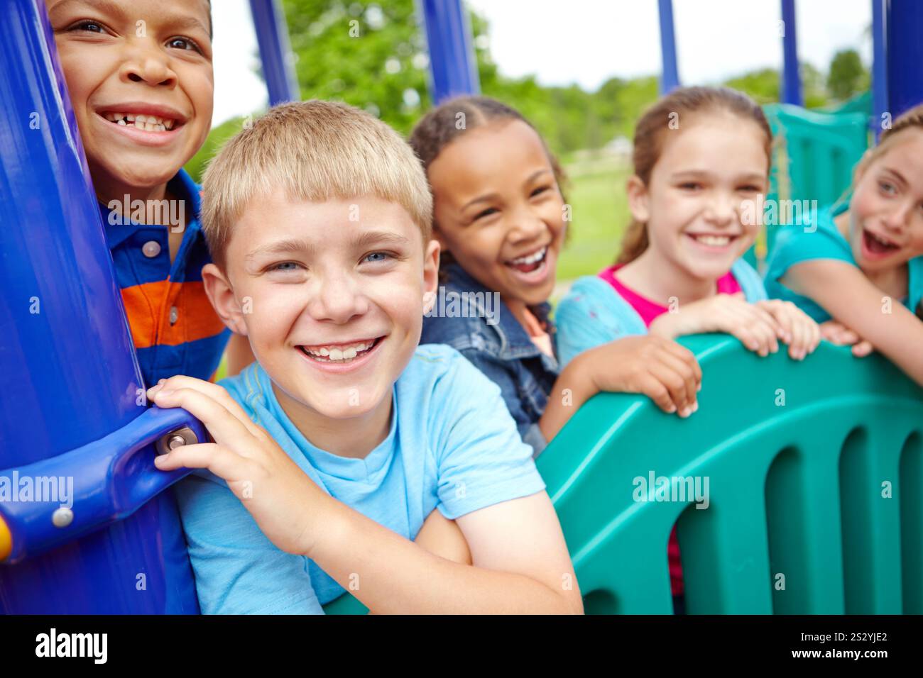 Friends, diversity and kids in playground for holiday, childhood and ...