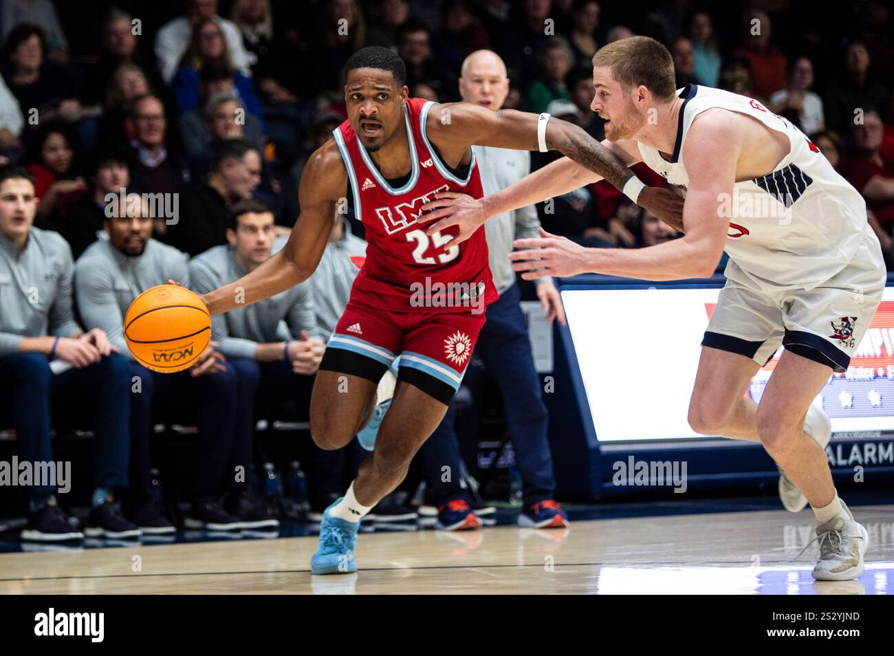 Moraga CA, U.S.A. January 07 2025 Loyola forward Caleb Stone-Carrawell (25)drives to the hoop ...