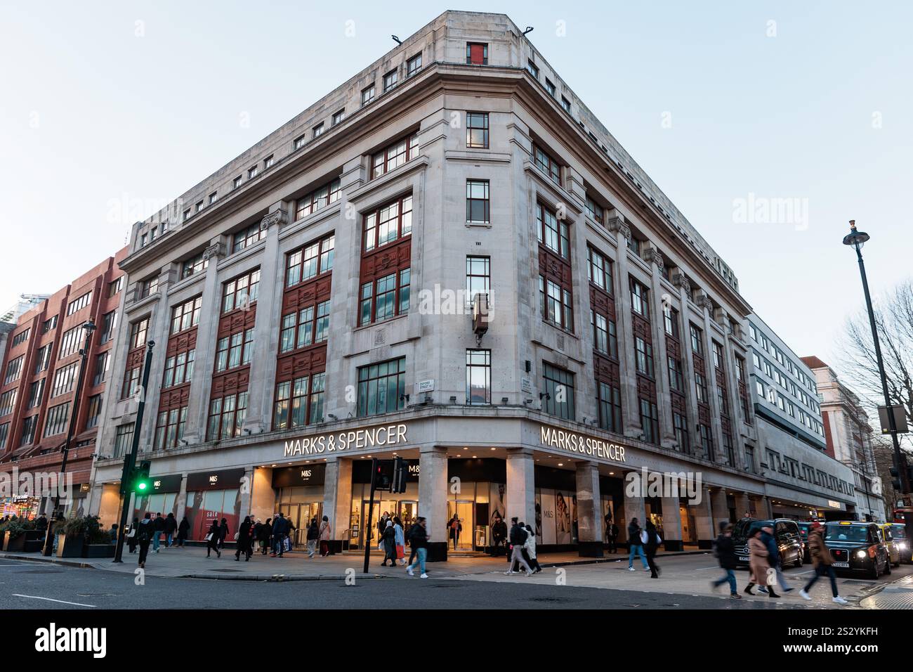 London, UK. 7th January, 2025. Members of the public walk past Marks ...
