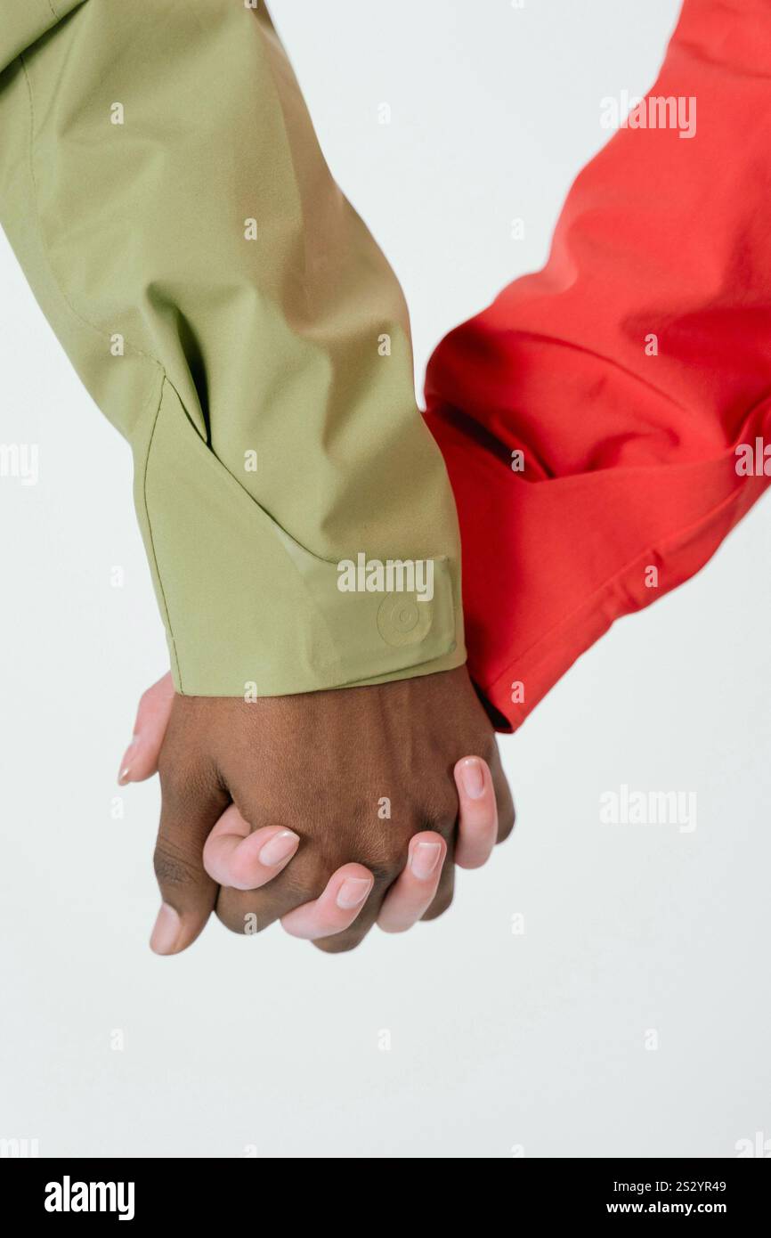Two LGBT guys holding hands Stock Photo - Alamy