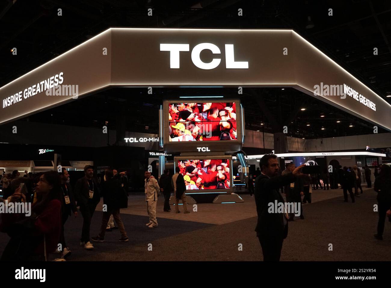 Las Vegas, USA. 7th Jan, 2025. People visit the exhibition area of Chinese company TCL during ...