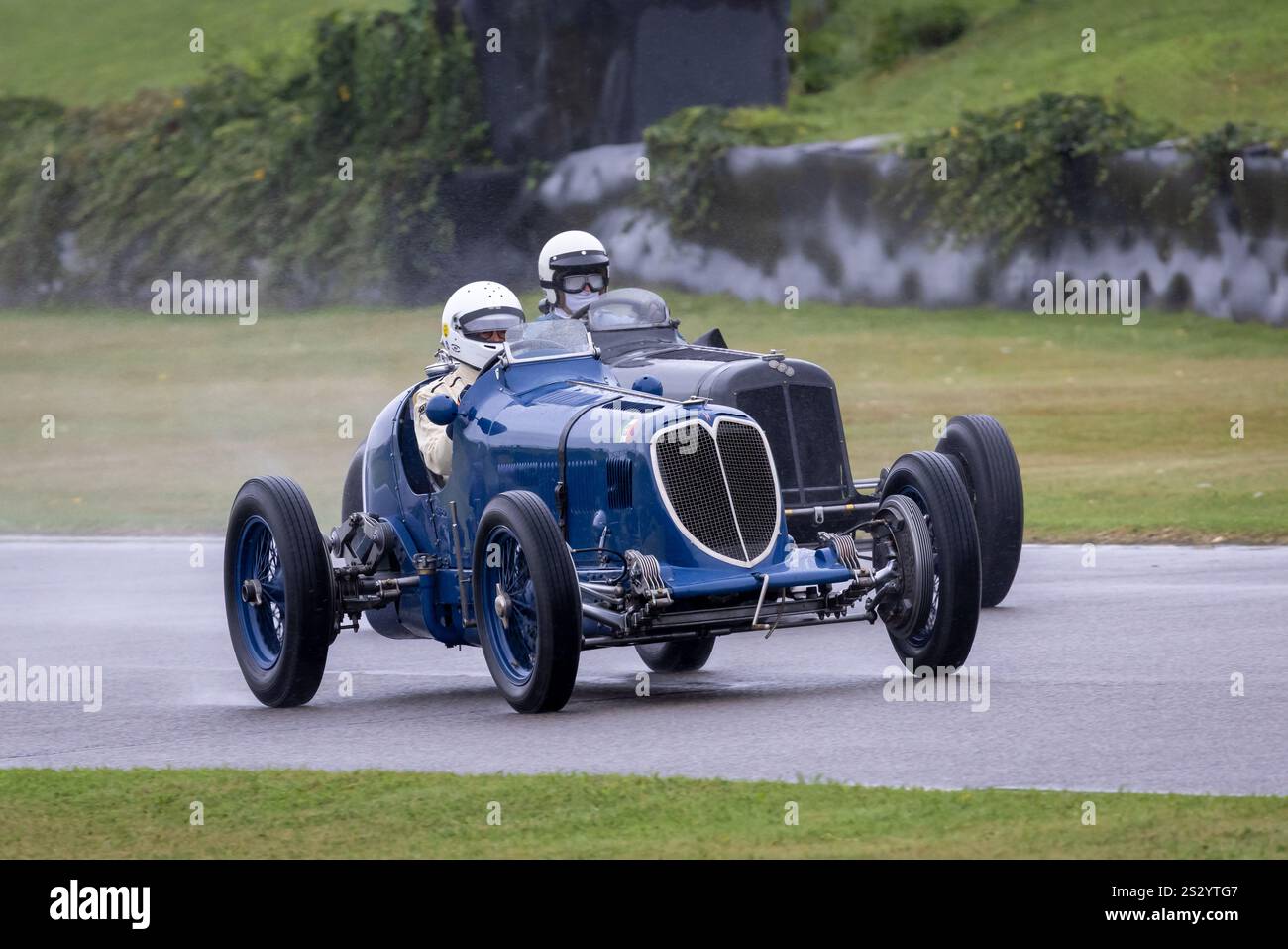 Josef Otto Rettenmaier in his 1933 Maserati 8CM during the Goodwood ...
