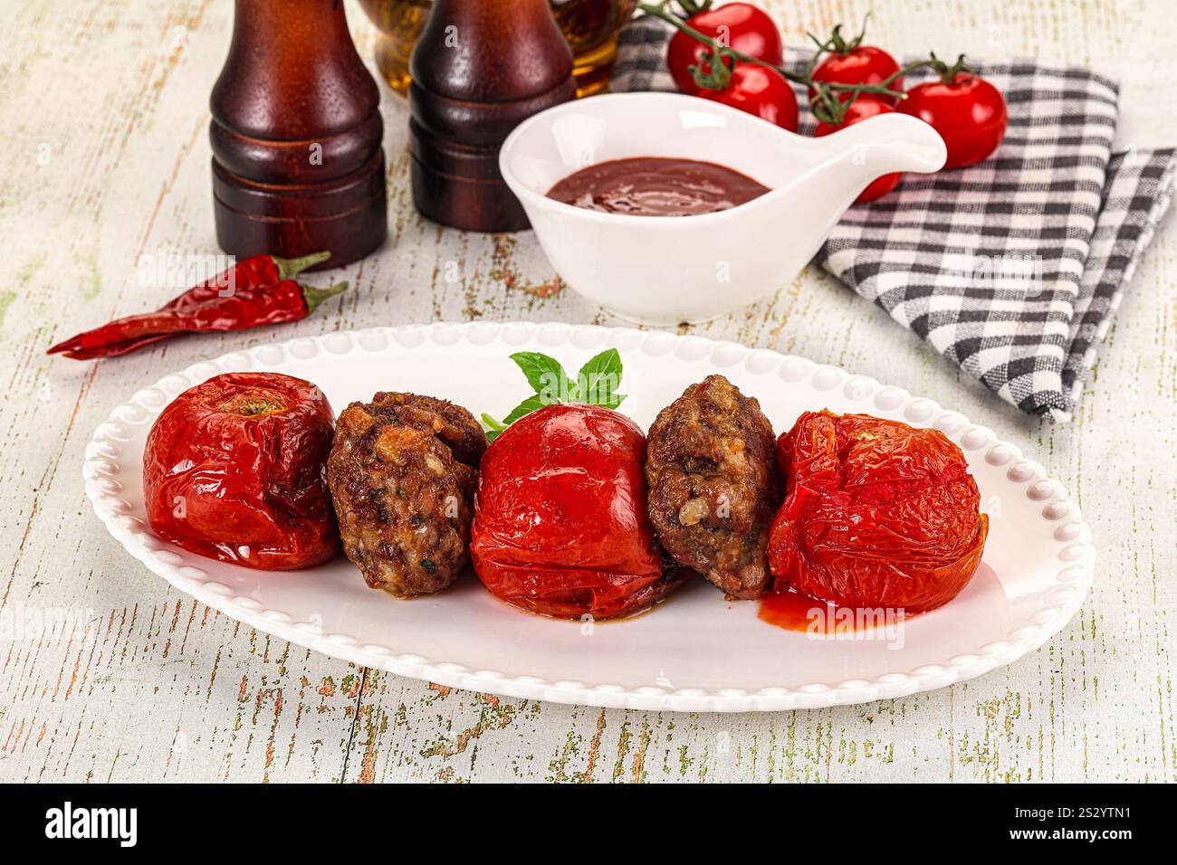 Turkish cuisine - Domatesli Kebab with minced meat and tomato Stock ...
