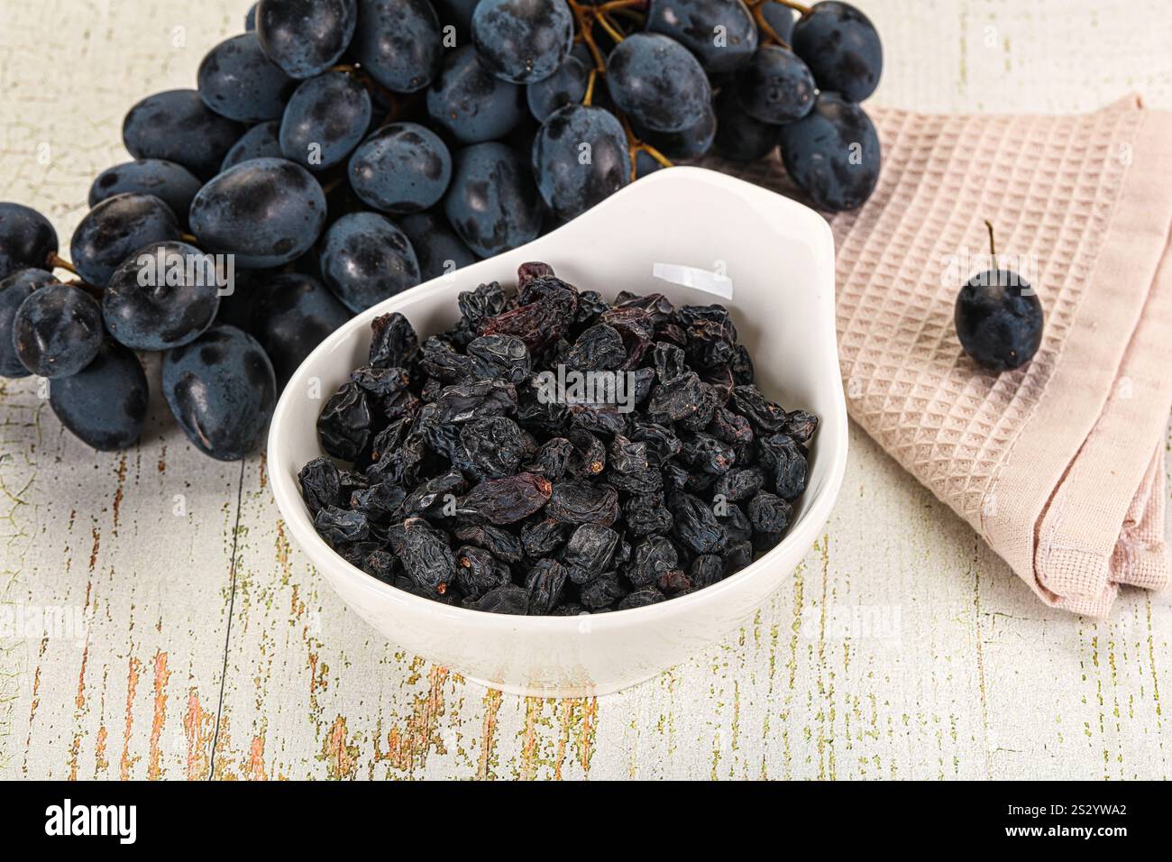 Dry ripe sweet blue raisin heap Stock Photo - Alamy