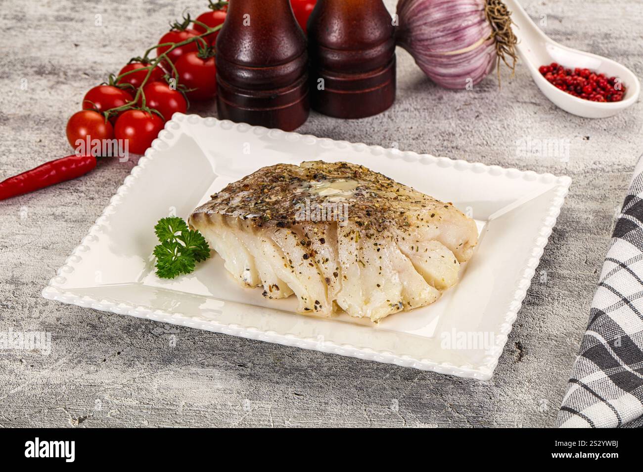 Dietary Baked cod fish fillet with spices Stock Photo - Alamy