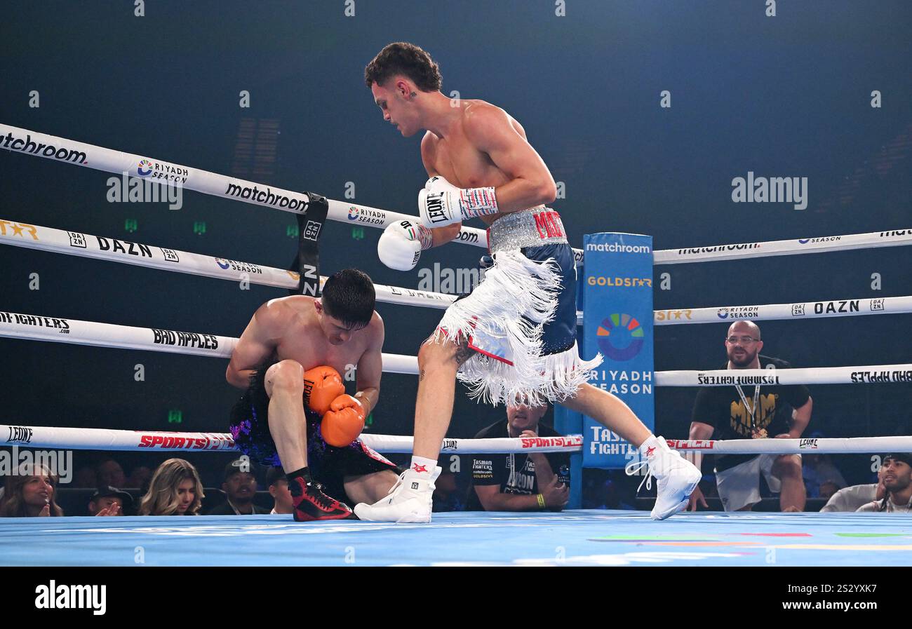 Australian Max McIntyre knocks down Abdulselam Saman of Turkey during ...
