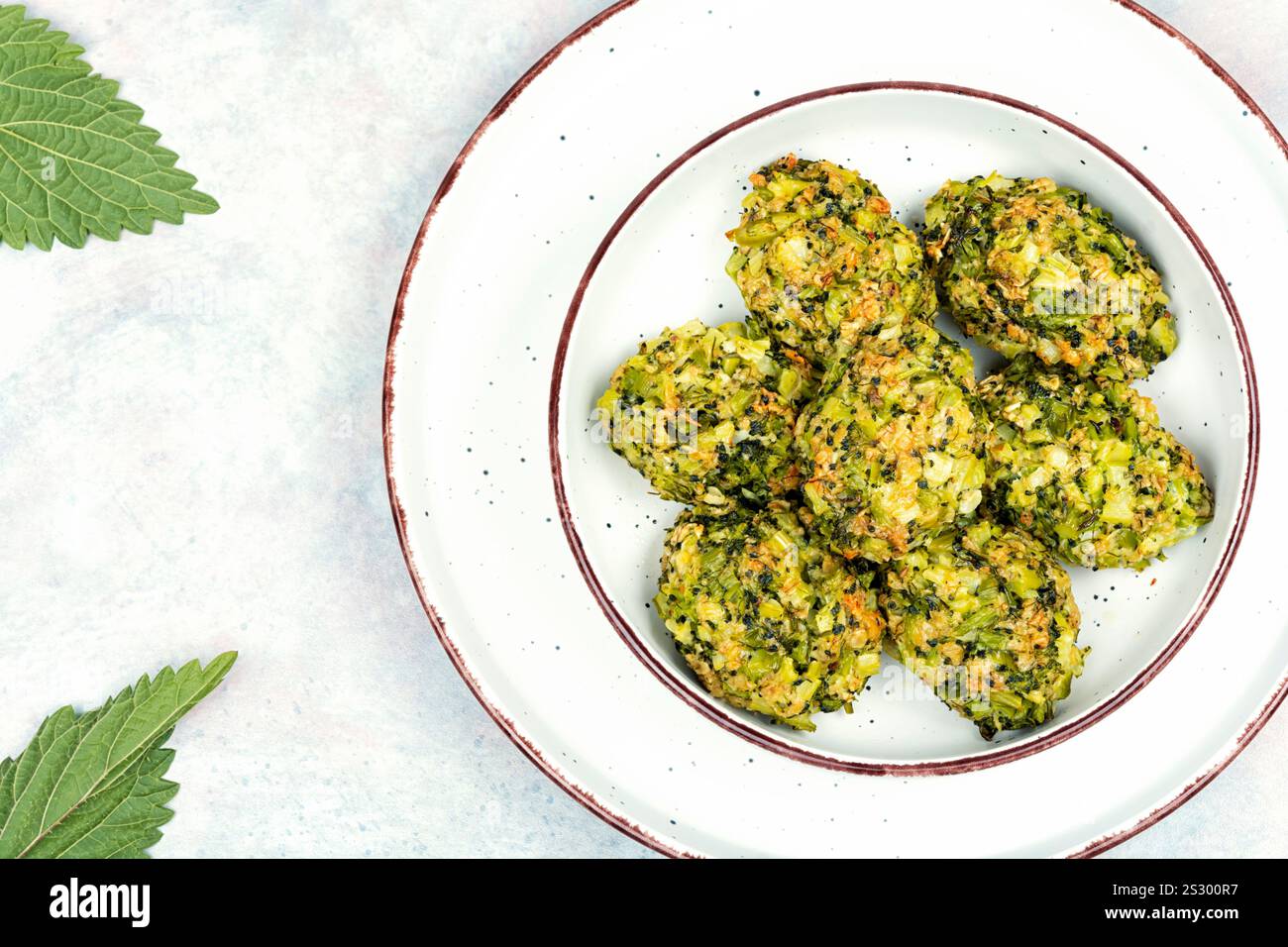 Baked green dietary cutlets made from young nettles. Vegetarian food ...