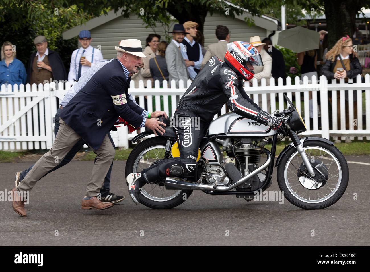 Andy Hornby on John Surtees 1955 Norton Manx prior to the John Surtees Celebration parade at the ...