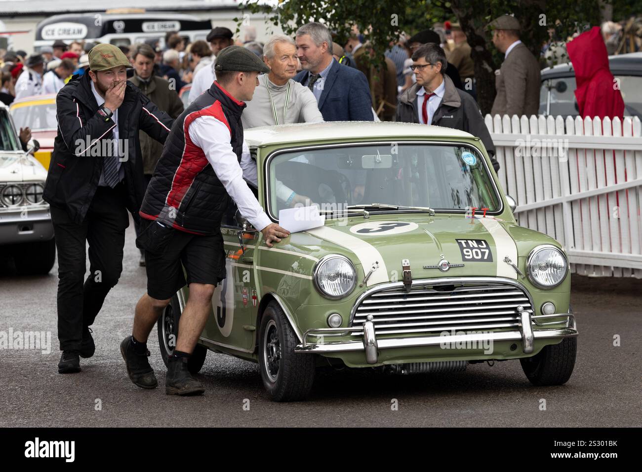 Tony Jardine brings his1965 Austin Mini Cooper S into the holding ...