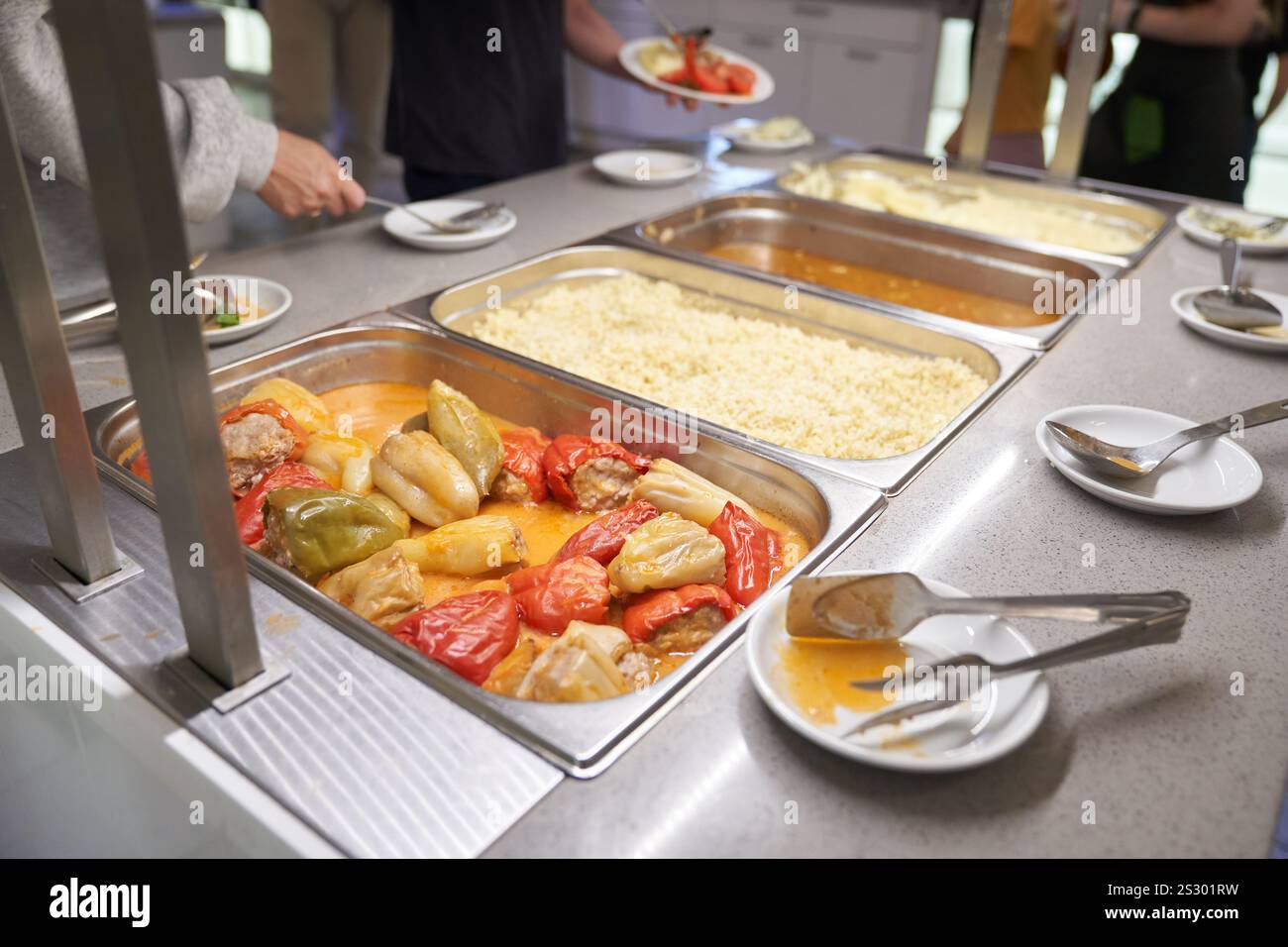 Traditional dishes in metal containers, a buffet with Russian dishes ...