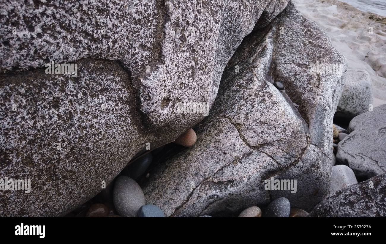 The cool Melted Rocks of Swamis Beach. Erosion control boulders placed ...